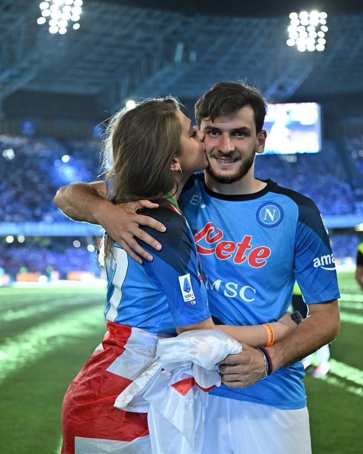 Napoli star Khvicha Kvaratskhelia lock lips with his partner as they ... Napoli star Khvicha Kvaratskhelia lock lips with his partner as they ...